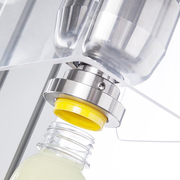 Semi-automatic capping machine Tenco